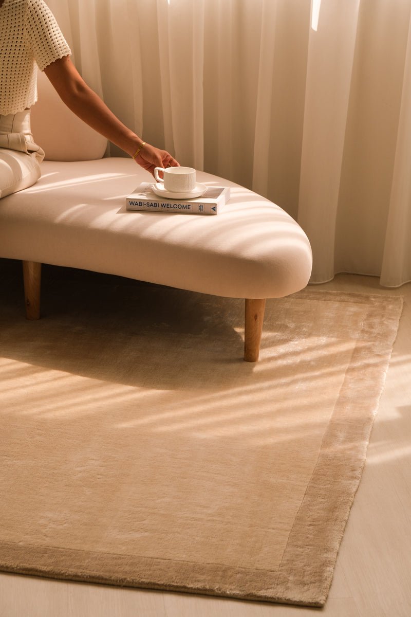 Silhouette Cloud Cream Bordered Tencel Area Rug | Living DNA SG
